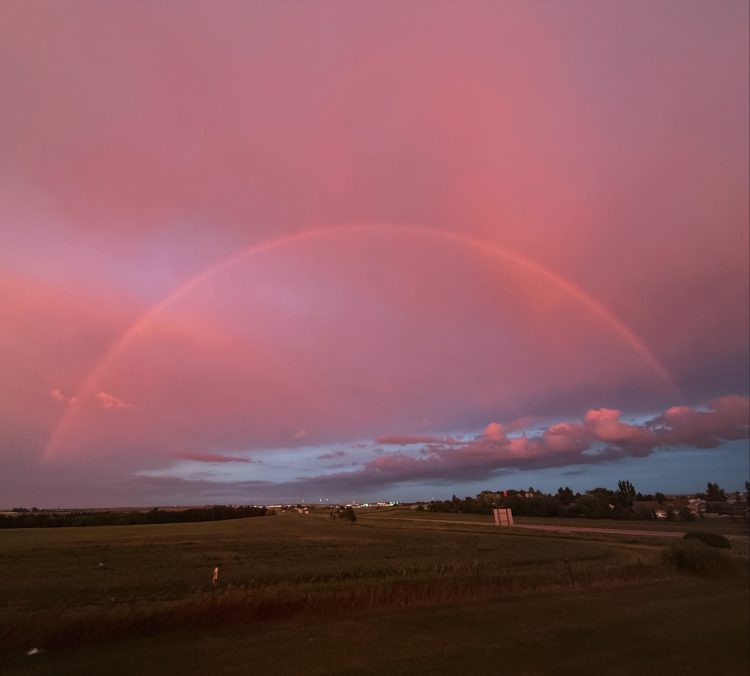 A pink rainbow - SkySpy Photos, Images, Video